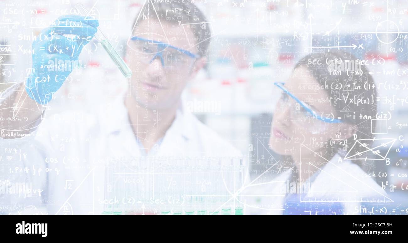 Scientists examining test tube with chemical formulas image over ...