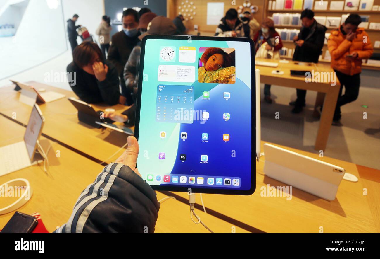 SHANGHAI, CHINA - FEBRUARY 4, 2025 - Customers experience IPAD tablets ...