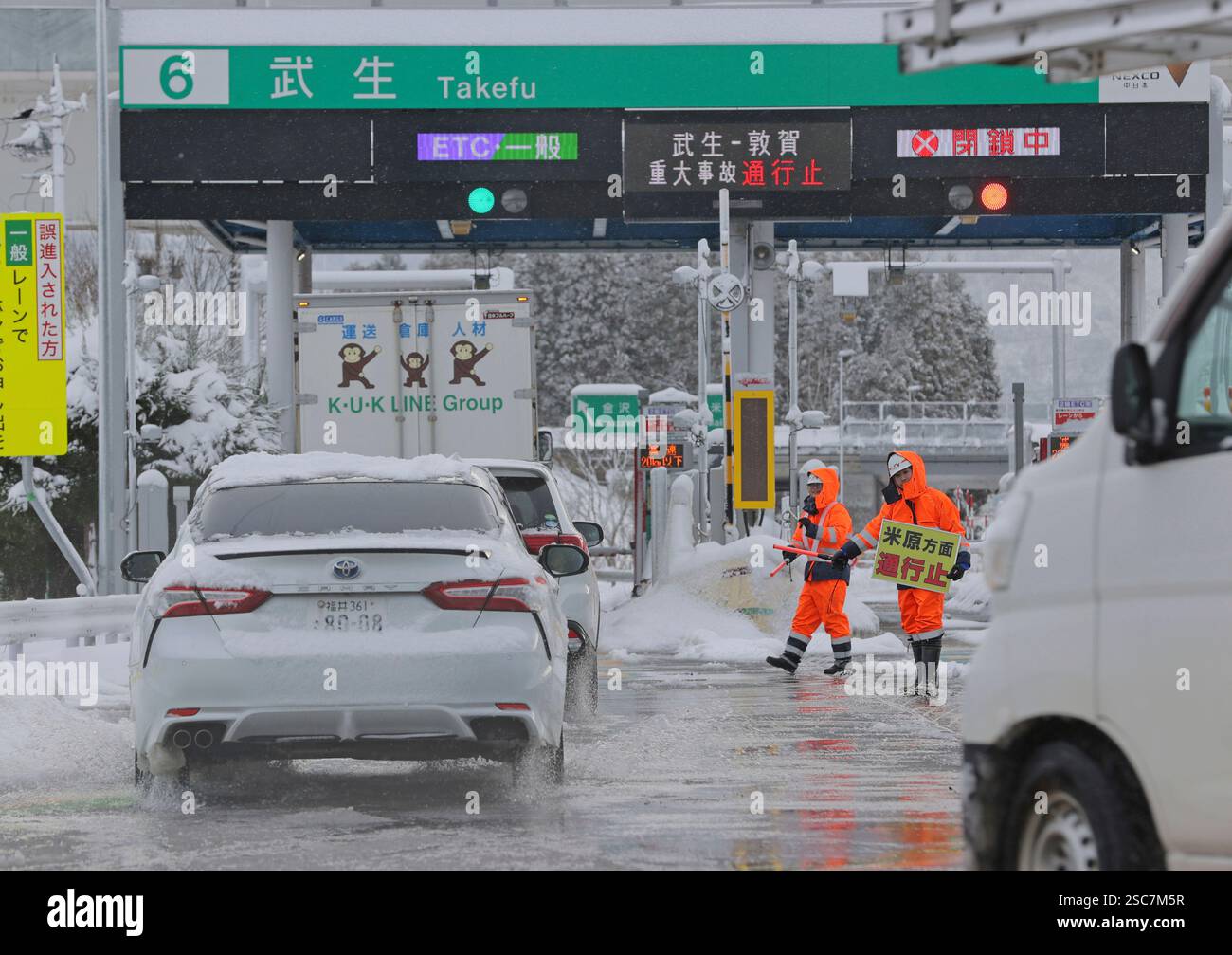 An electronic signboard shows a notice of the road closure due to a ...