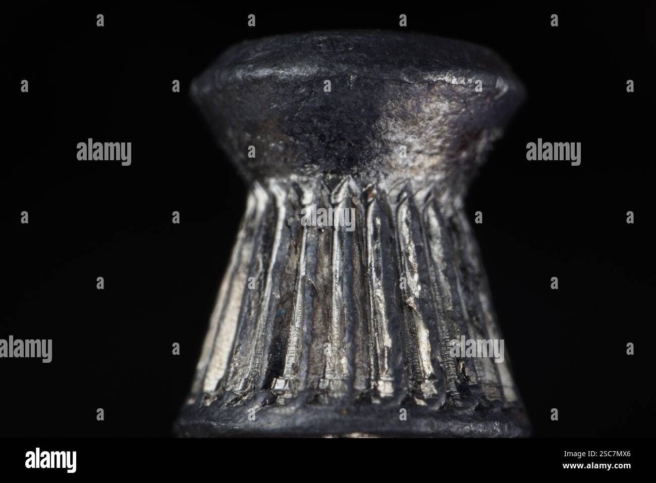 Lead projectile of 4. 5mm air pressure gun under black background Stock ...