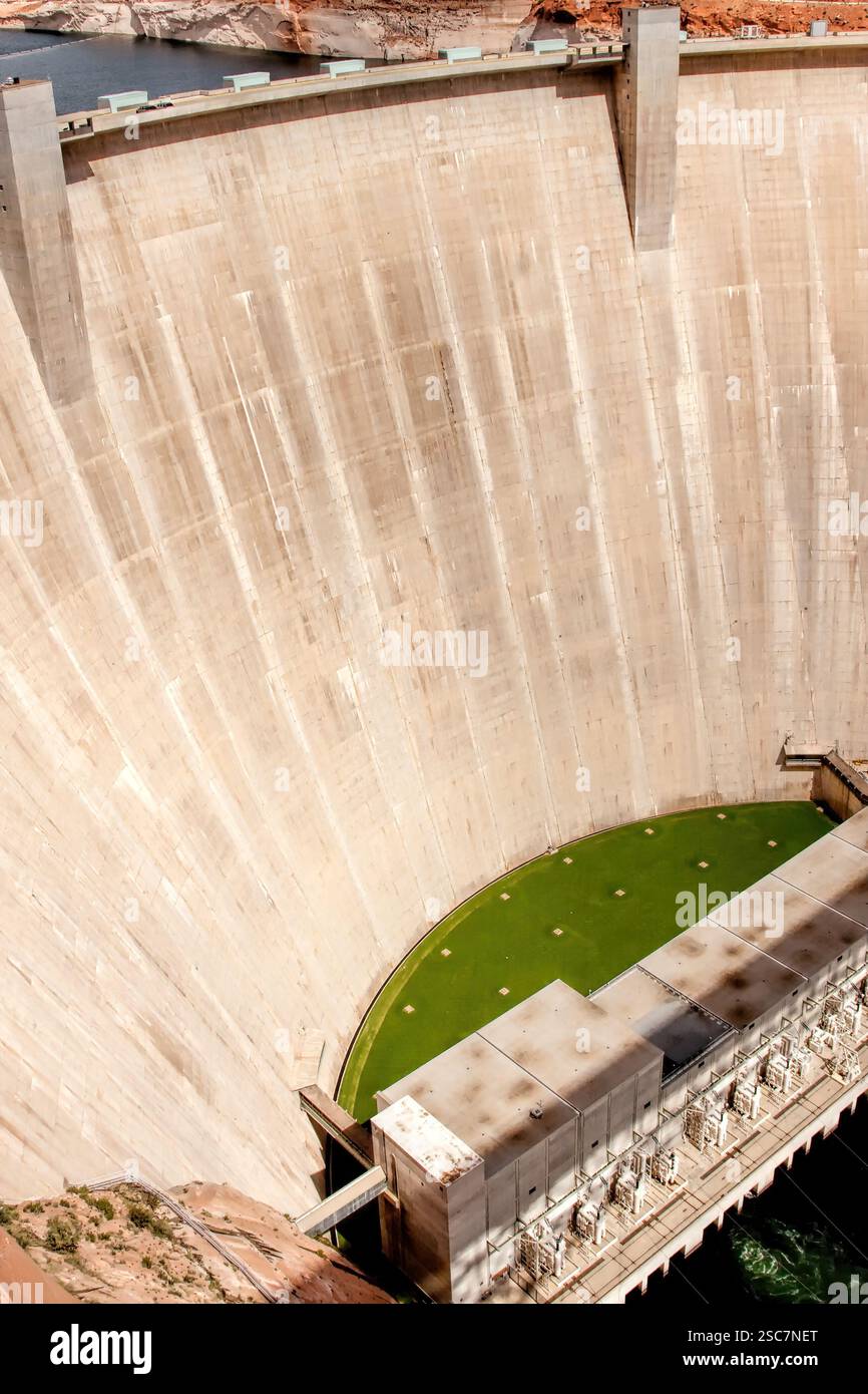 A large concrete structure with a green area in the middle. The green ...