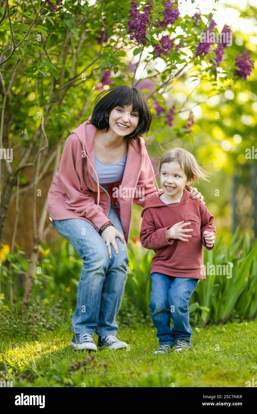 Cute big sister cuddling with her toddler brother. Adorable teenager ...