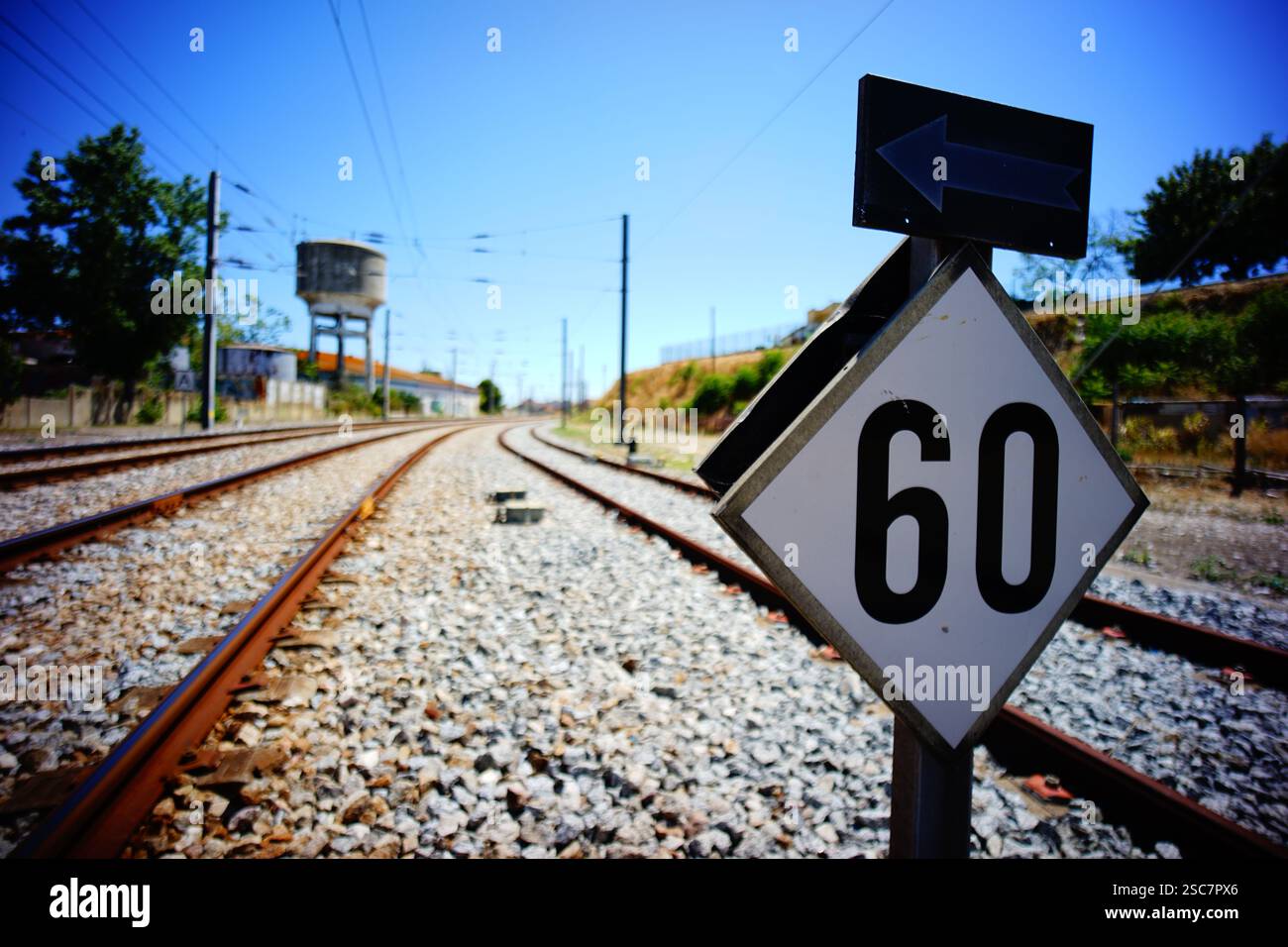 Railway lines with traffic regulator sign with the numbering 60 Stock ...