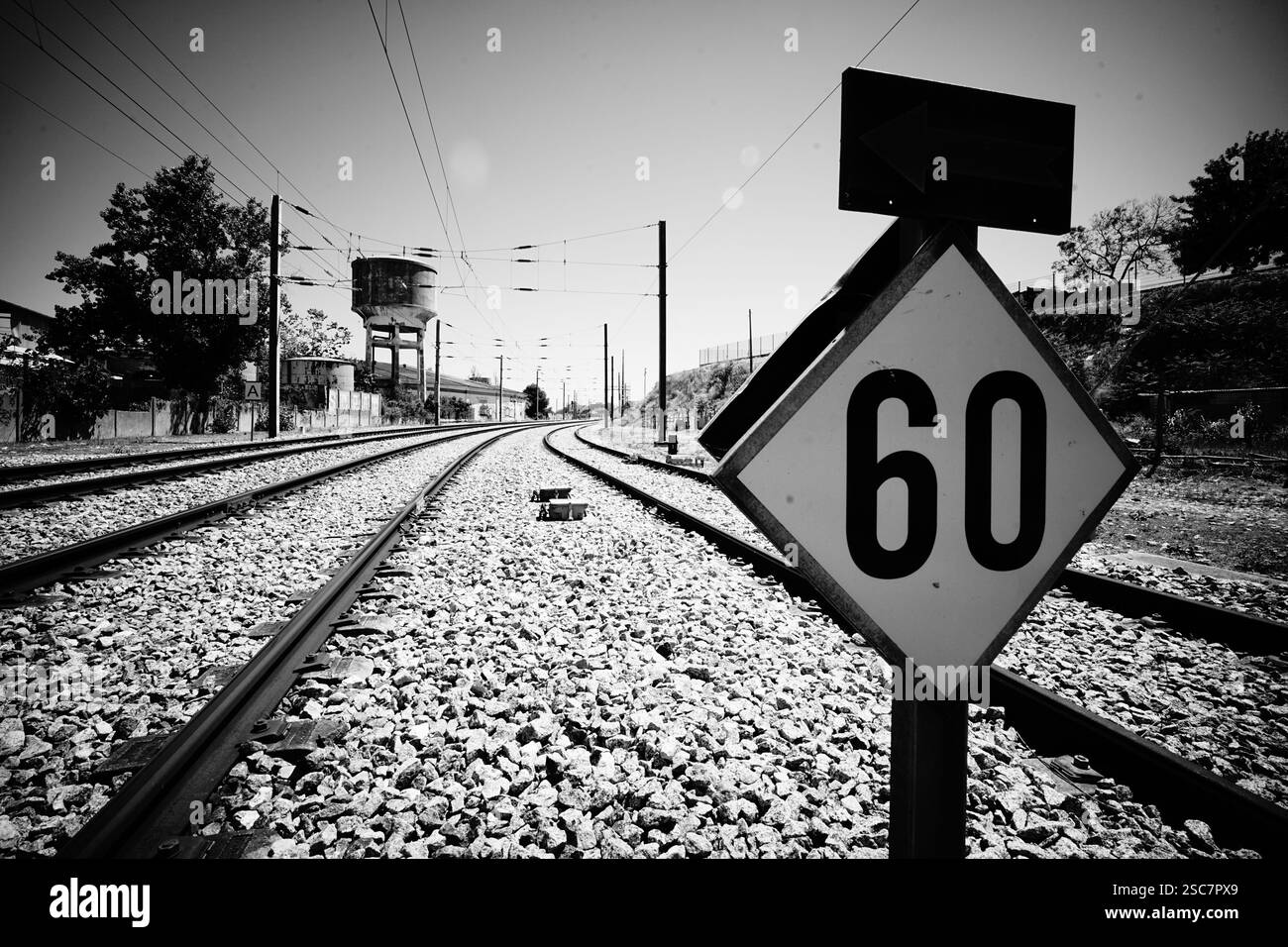 Railway lines with traffic regulator sign with the numbering 60 Stock ...