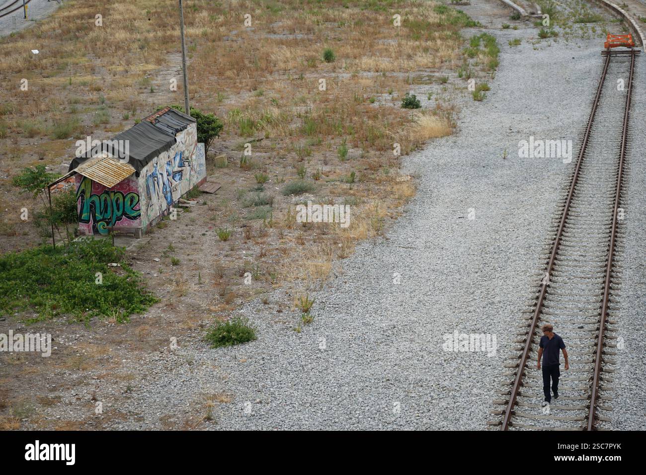 Train line on the right and small house on the left with hope meaning ...