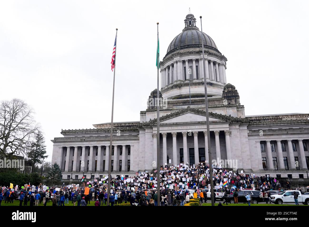 People gather to protest against the Trump administration and Project ...