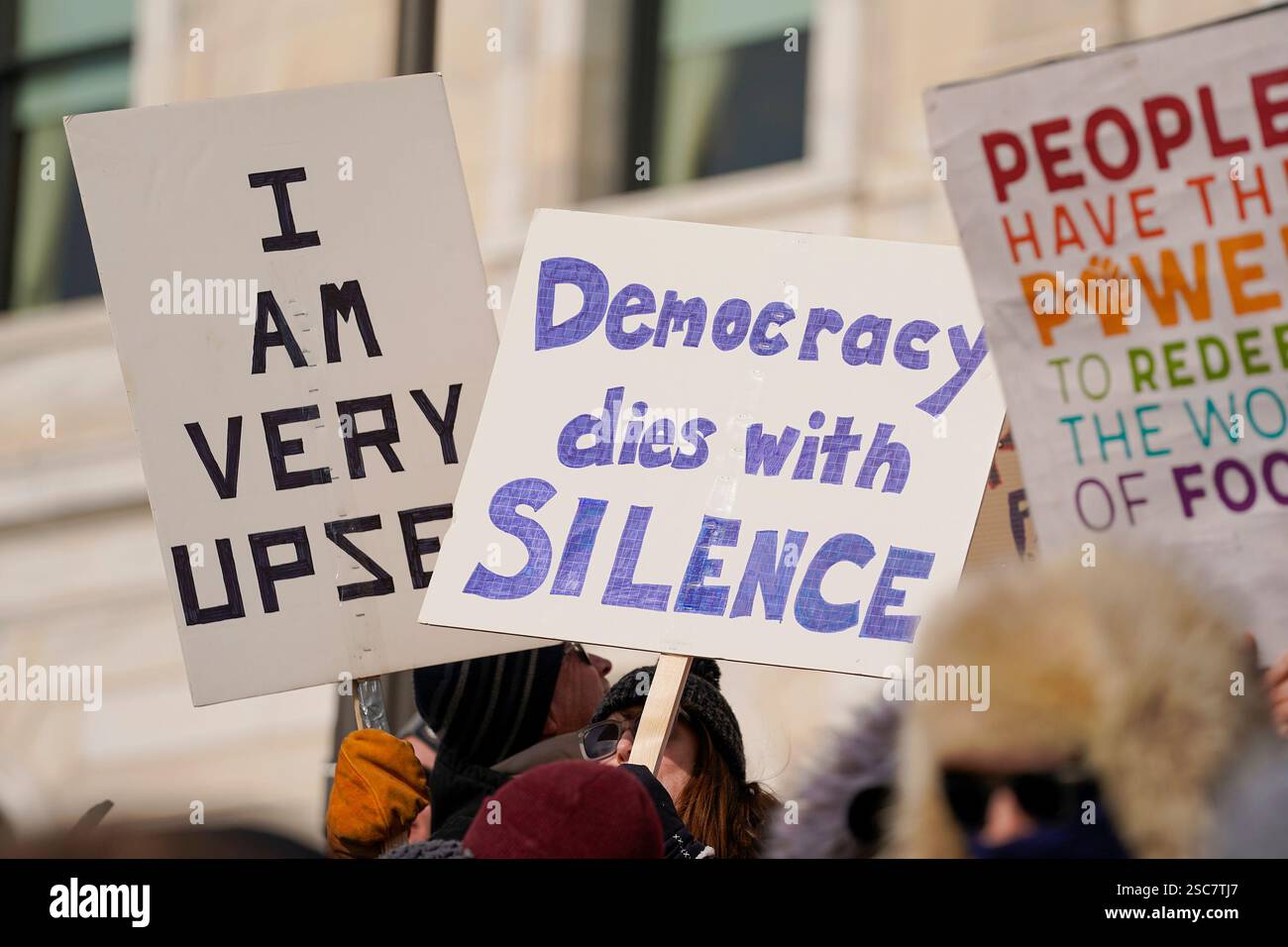 ST. PAUL, MN - FEBRUARY 05: Protesters display their signs during the ...