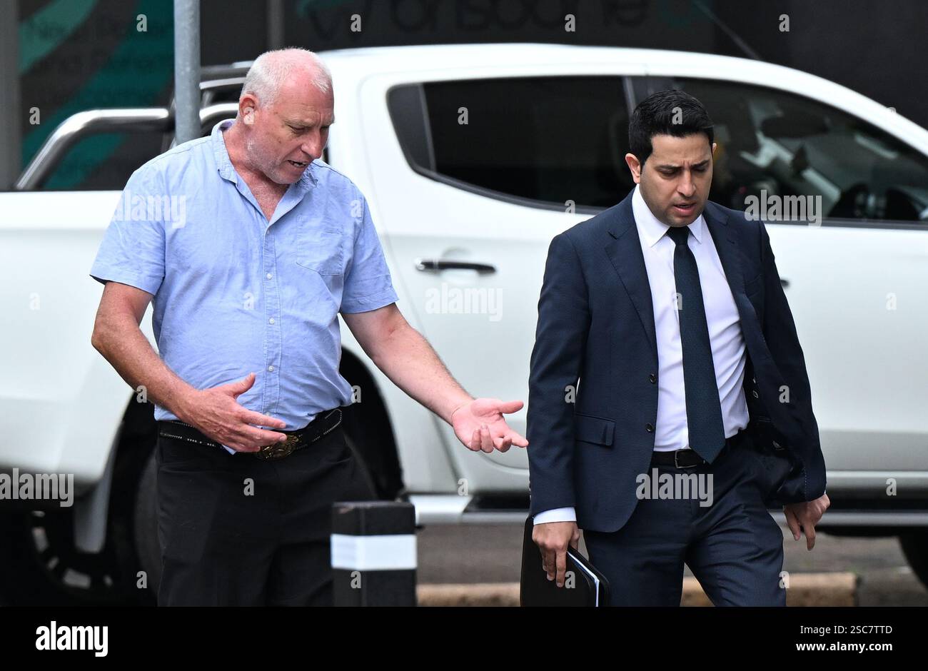 Robert Joseph Keene (left) is seen arriving at the Brisbane District ...