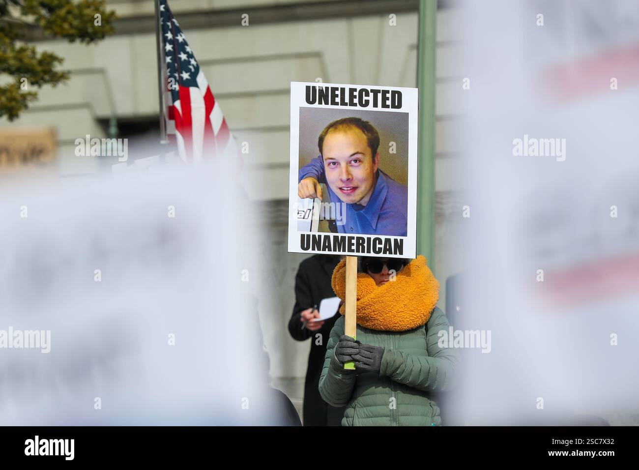 Harrisburg, United States. 05th Feb, 2025. A protester holds an anti ...