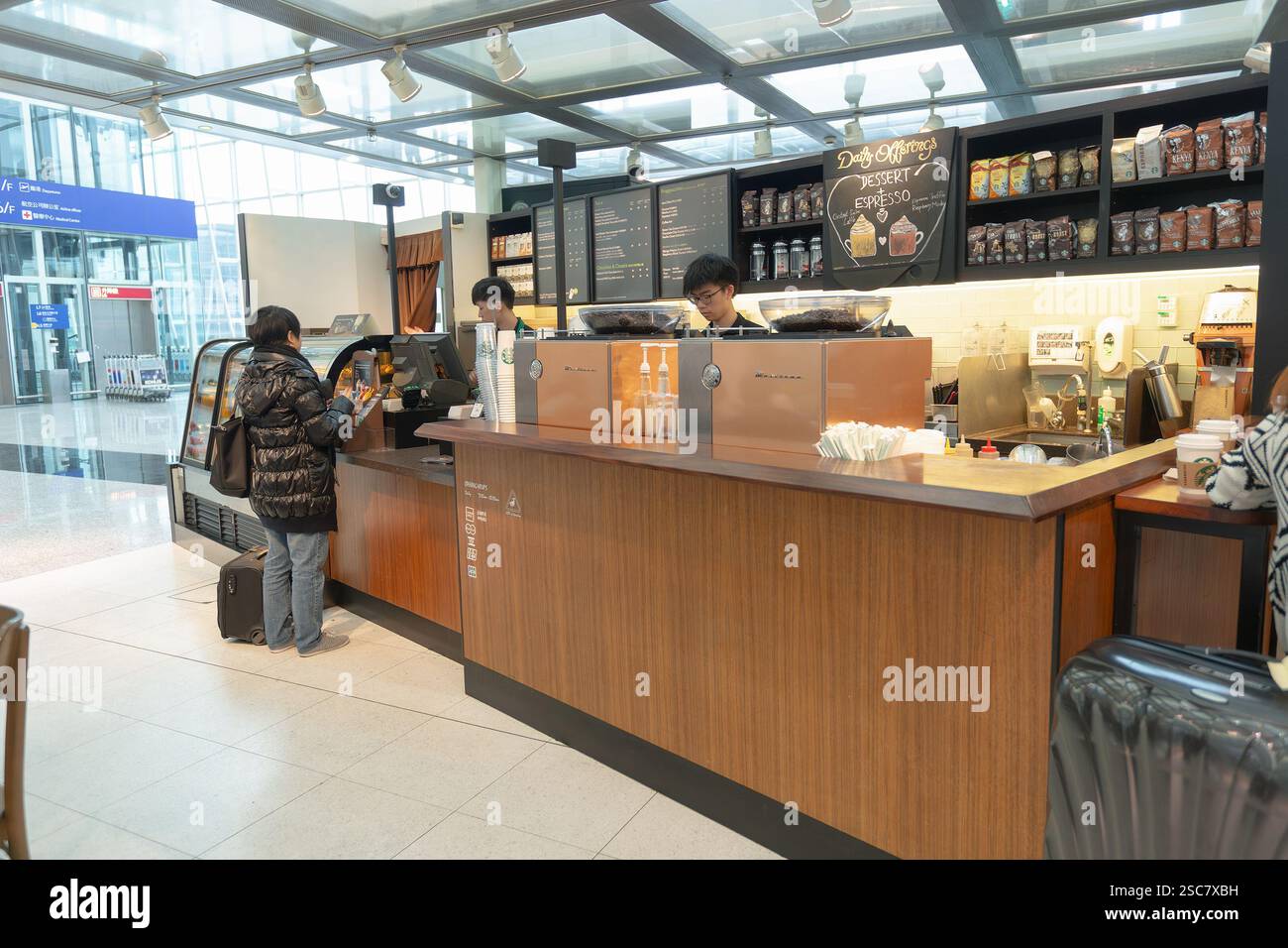 Hong Kong, China - February 05, 2015: a woman placing an order at the ...