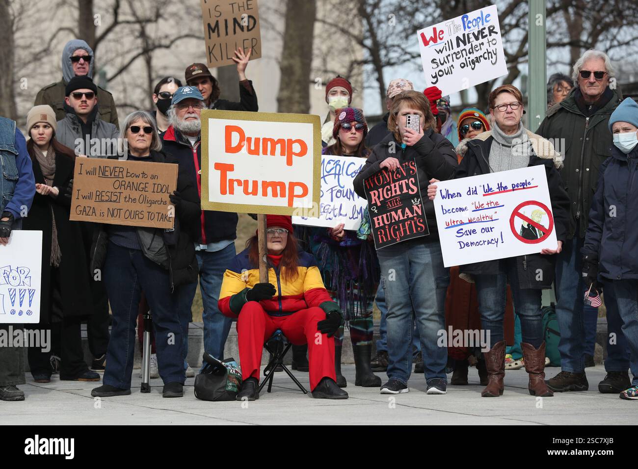 Harrisburg, United States. 05th Feb, 2025. Protesters hold signs on the ...