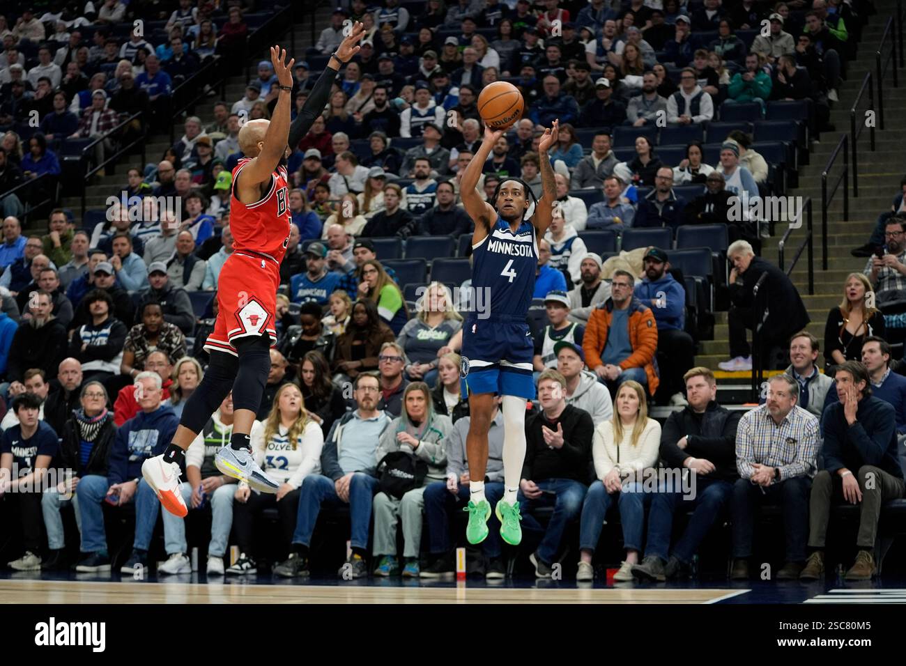 Minnesota Timberwolves guard Rob Dillingham (4) shoots over Chicago ...