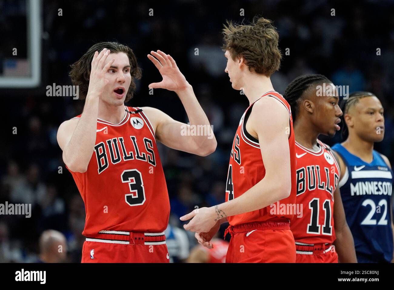 Chicago Bulls guard Josh Giddey (3) talks with forward Matas Buzelis ...