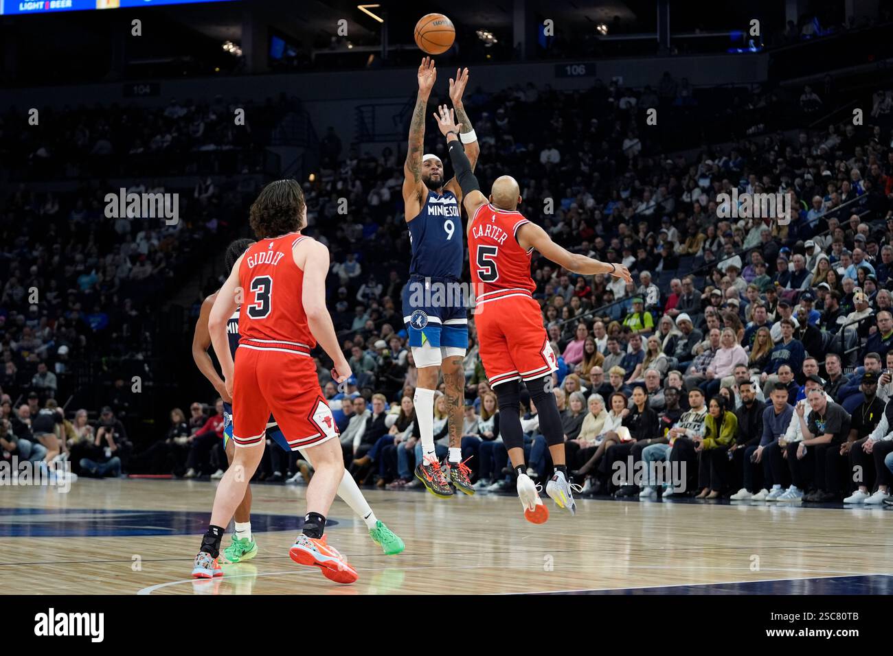 Minnesota Timberwolves guard Nickeil Alexander-Walker (9) shoots over ...