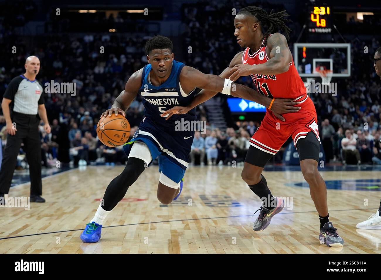 Minnesota Timberwolves guard Anthony Edwards (5) works toward the ...