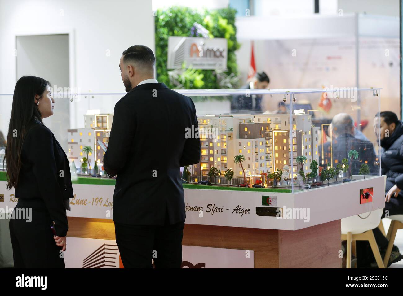 Algiers. 6th Feb, 2025. People visit the 2nd Algerian real estate fair ...