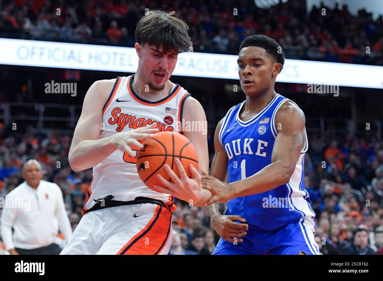 Syracuse forward Petar Majstorovic, left, grabs a loose ball in front ...