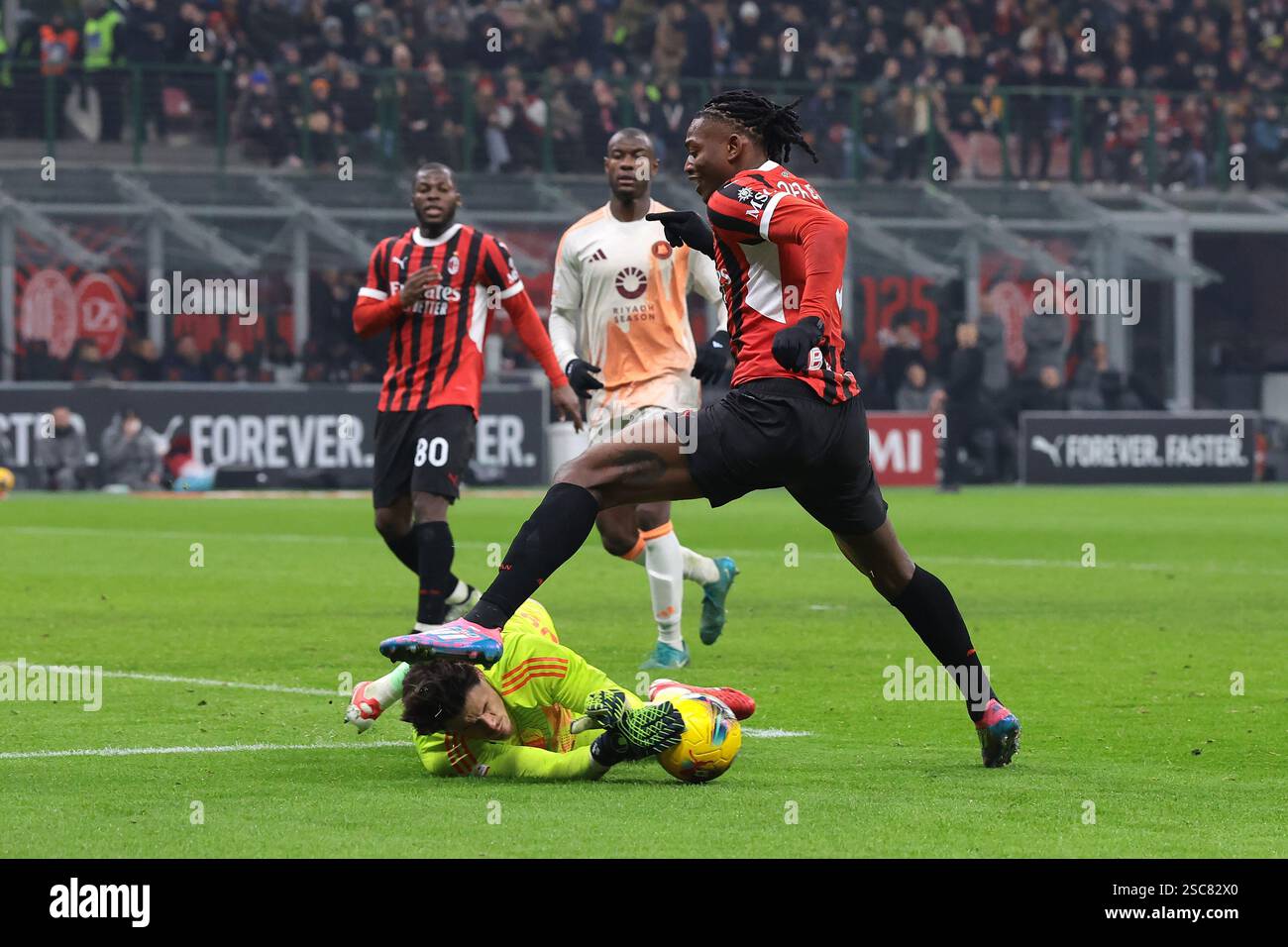 Milan, Italy. 5th Feb, 2025. Yunus Musah of AC Milan and Evan N'Dicka of AS Roma look on as Mile ...