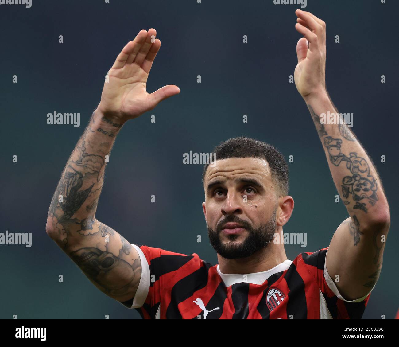 Milan, Italy. 5th Feb, 2025. Kyle Walker of AC Milan applauds the fans ...