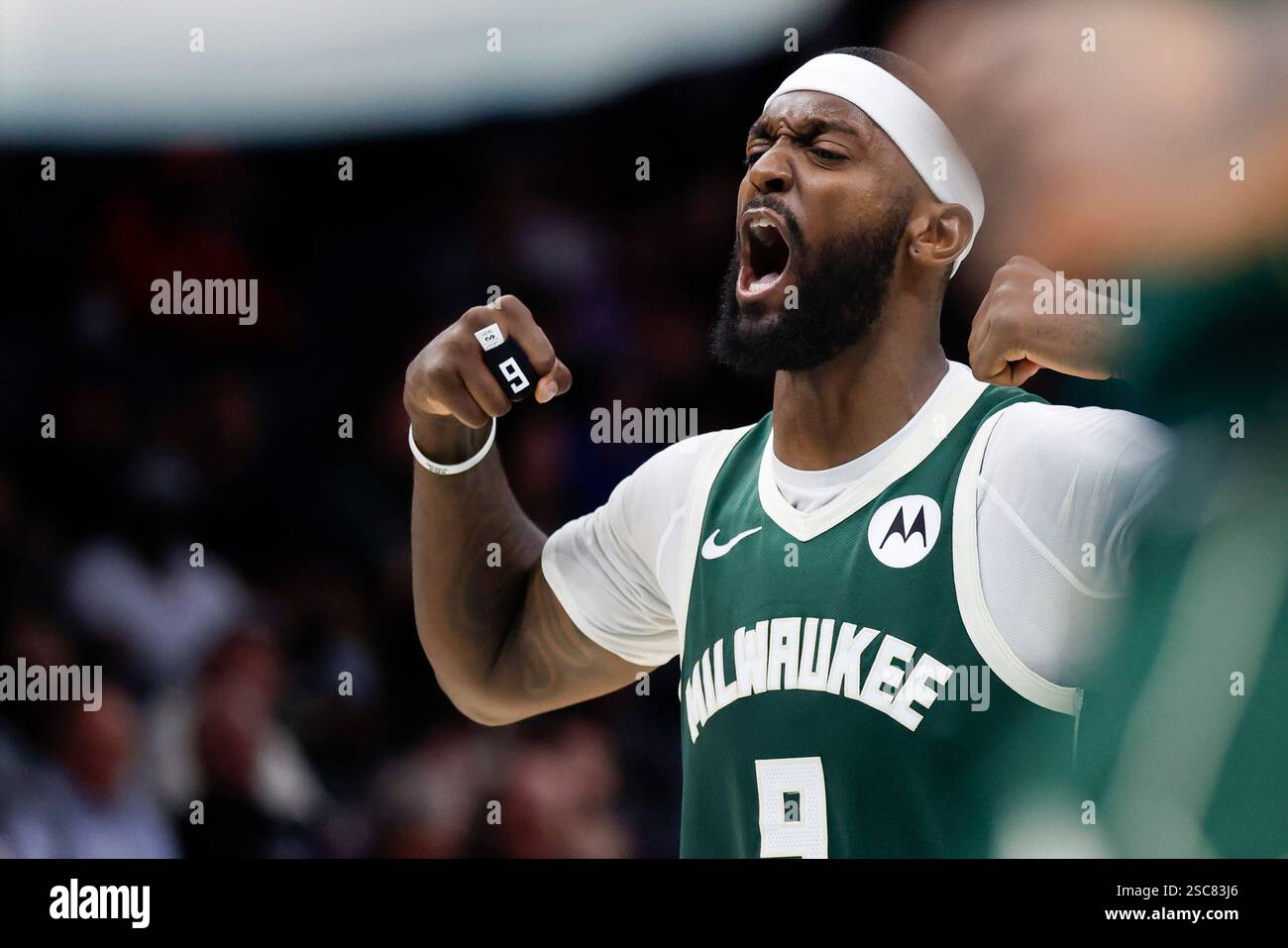 Milwaukee Bucks forward Bobby Portis Jr. flexes after a Bucks basket ...