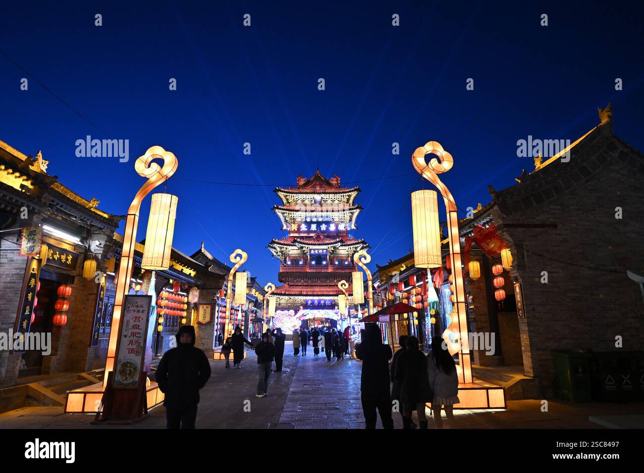 Taiyuan, China's Shanxi Province. 5th Feb, 2025. People visit a lantern ...
