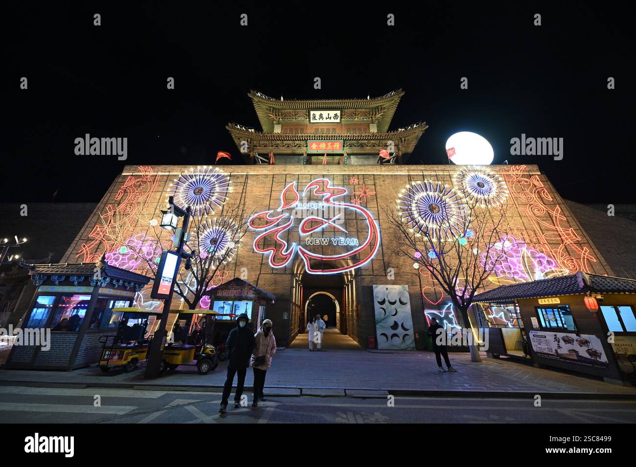 Taiyuan, China's Shanxi Province. 5th Feb, 2025. People visit a lantern ...
