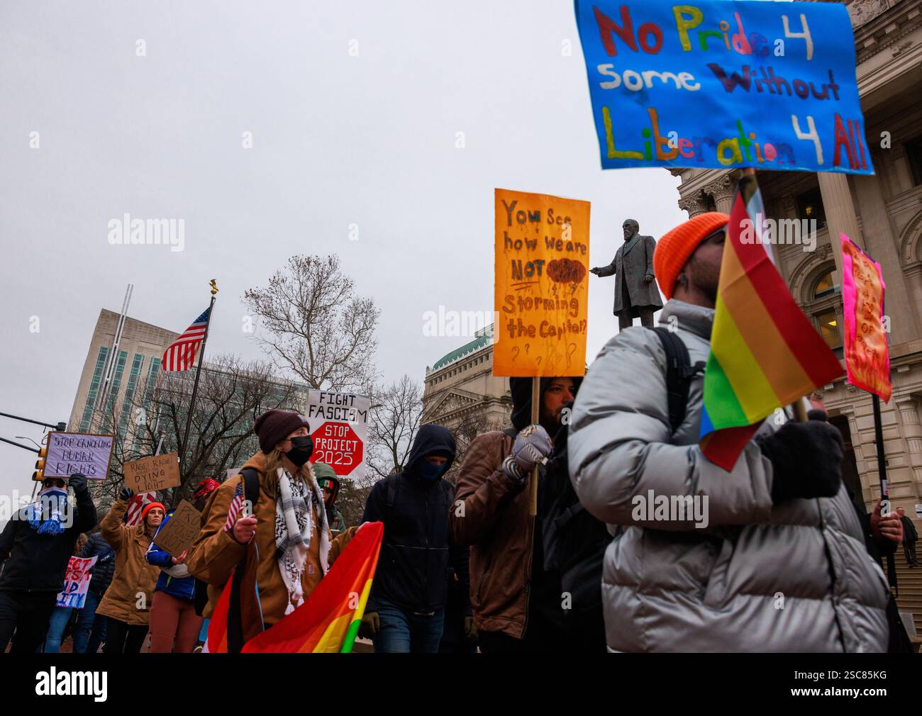 INDIANAPOLIS, INDIANA - FEBRUARY 5: Demonstrators holding signs march ...