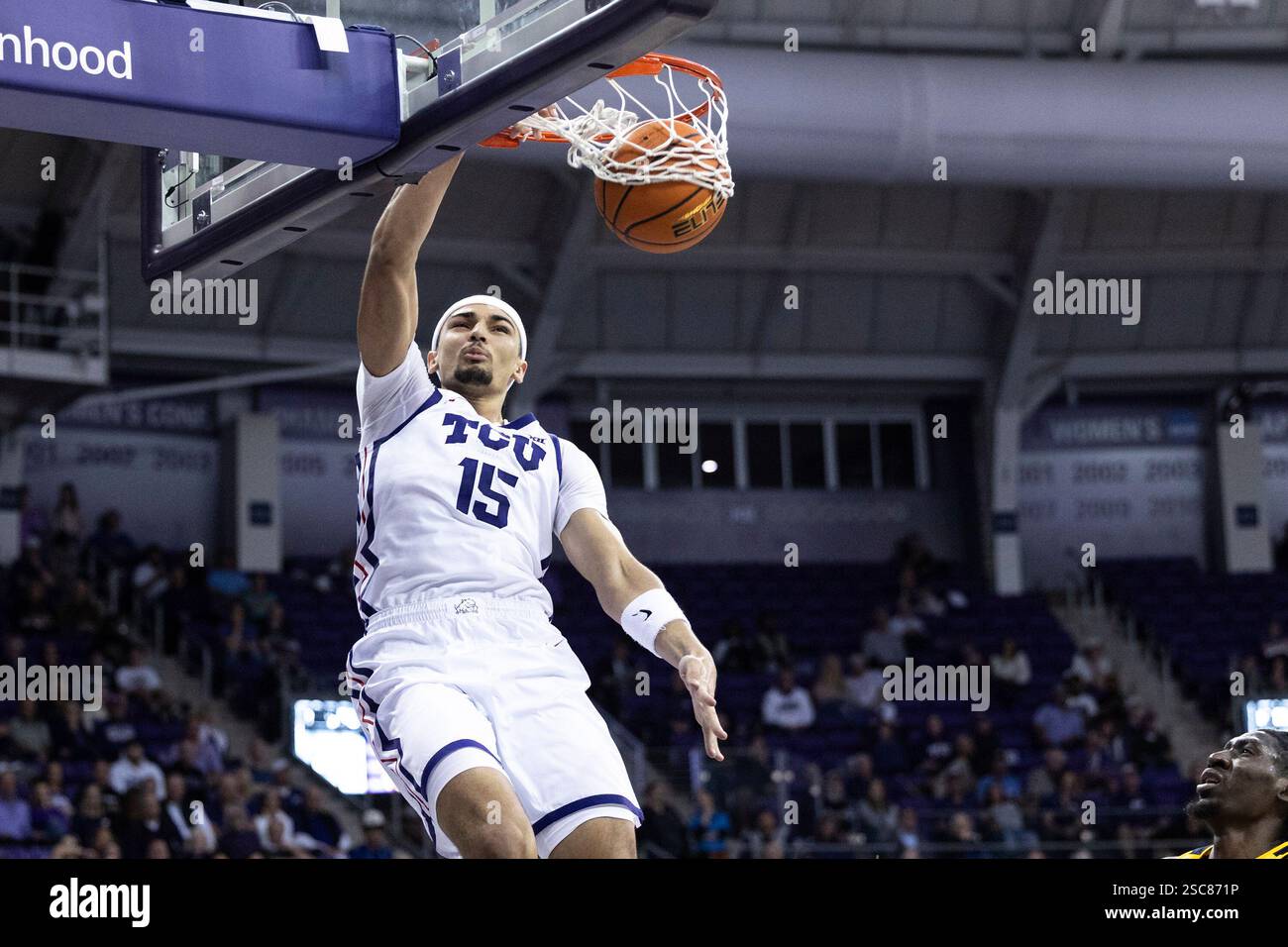 TCU forward David Punch (15) dunks the ball in transition in the second ...