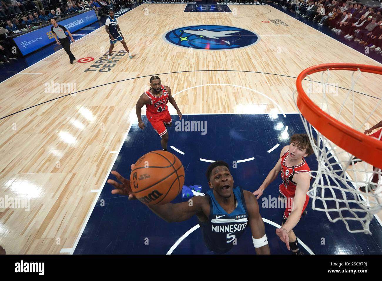 Minnesota Timberwolves guard Anthony Edwards (5) goes up for a shot ...