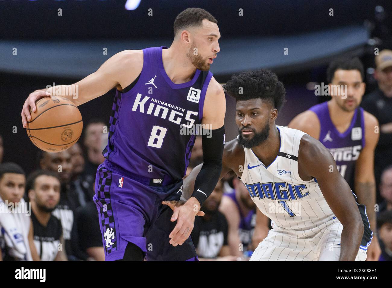 Sacramento Kings guard Zach LaVine (8) is guarded by Orlando Magic ...