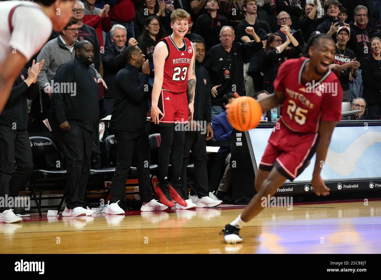 Rutgers' PJ Hayes IV, center, and Jeremiah Williams, right, react ...