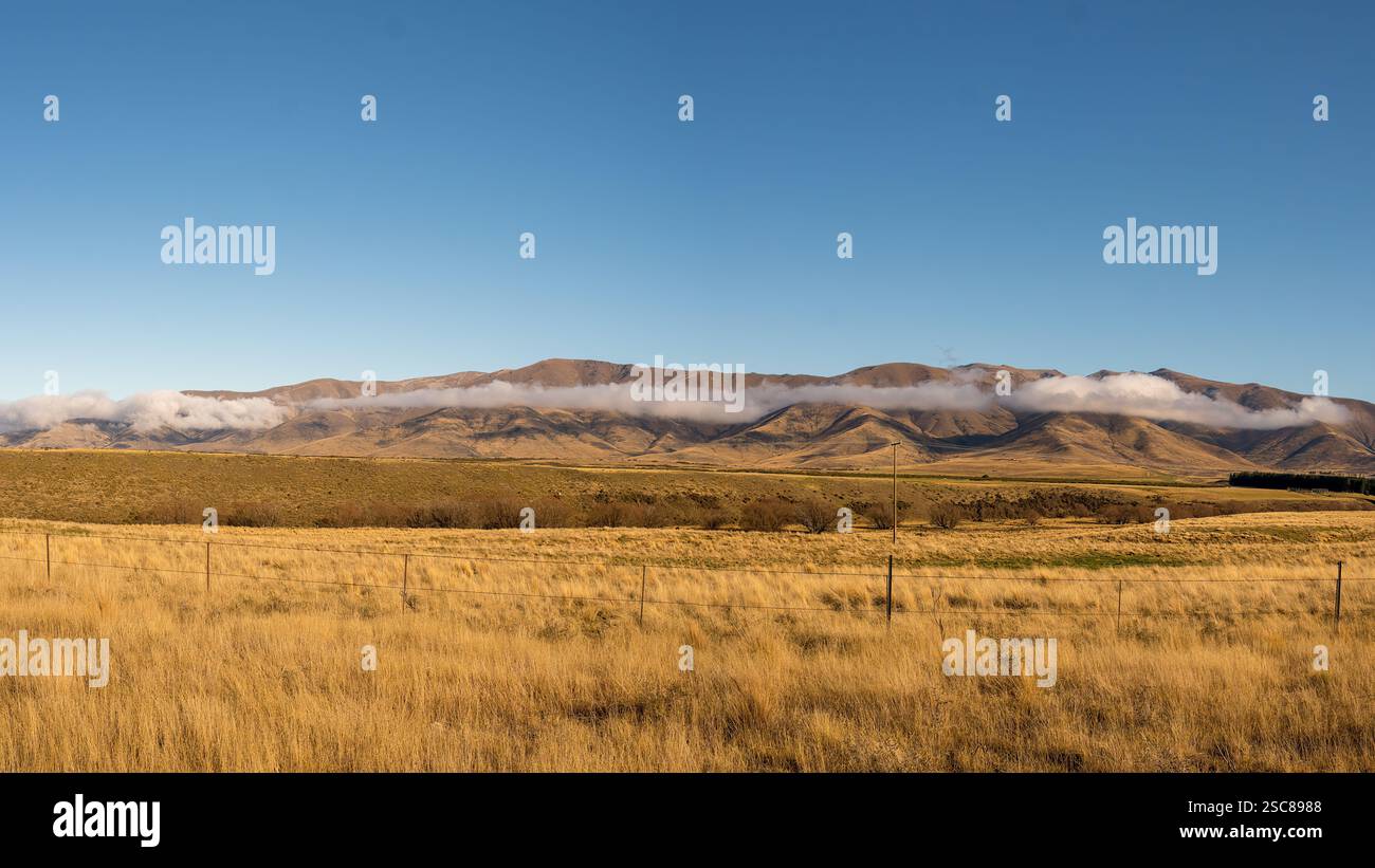 Agricultural pasture land in the high country of the south island of NZ ...