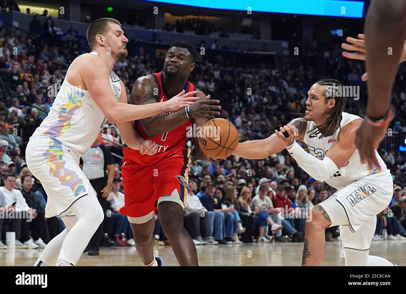New Orleans Pelicans forward Zion Williamson, center, drives between ...