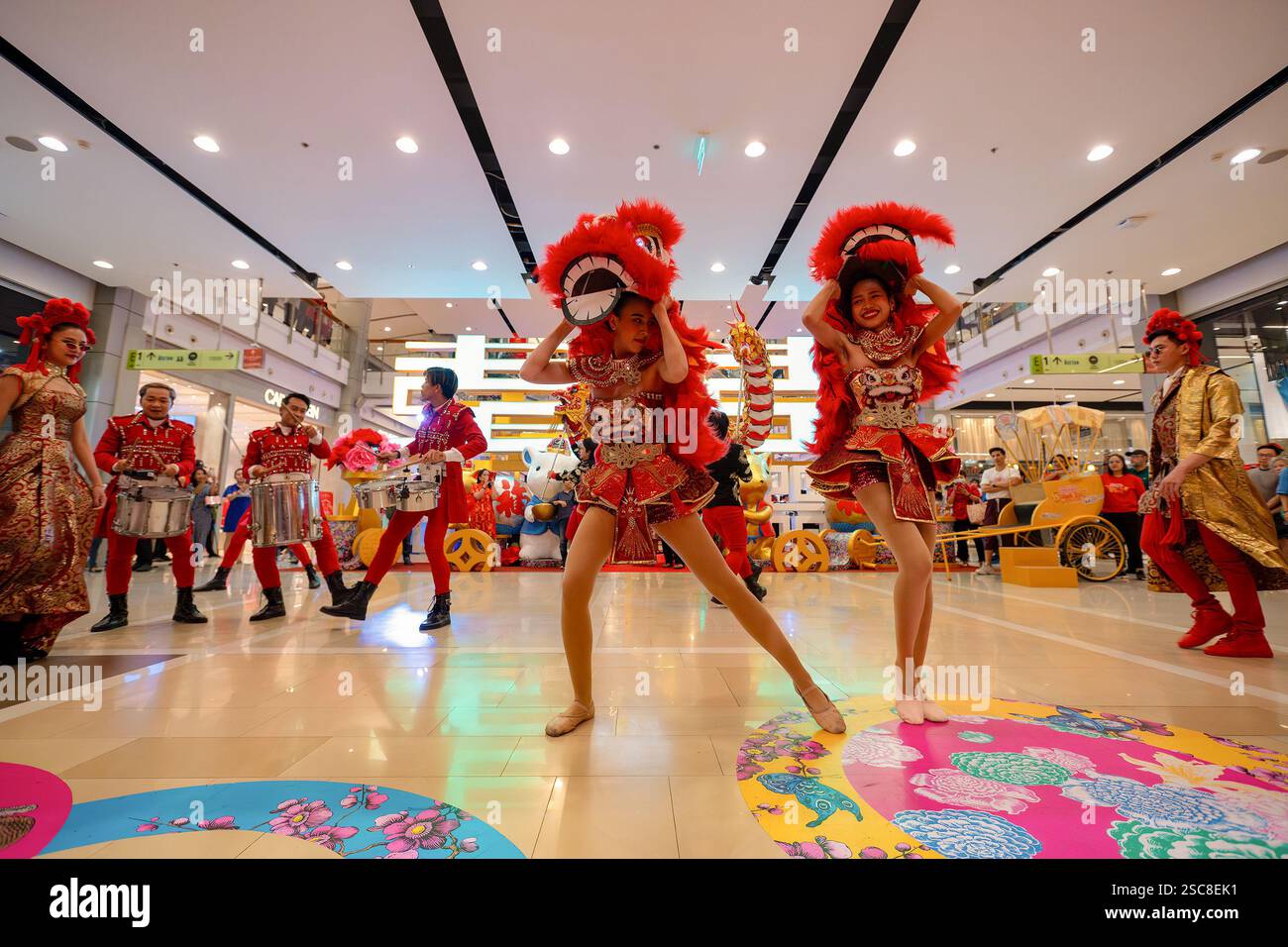 Bangkok, Thailand - January 24, 2020: performers wearing traditional Chinese head costumes as ...