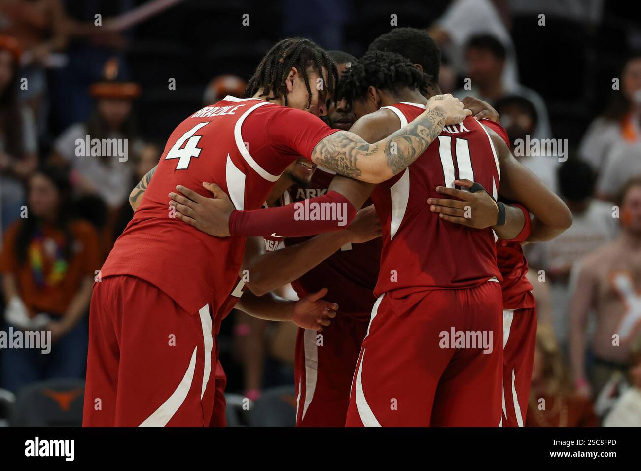 AUSTIN, TX - FEBRUARY 05: Arkansas Razorbacks players huddle up late in ...
