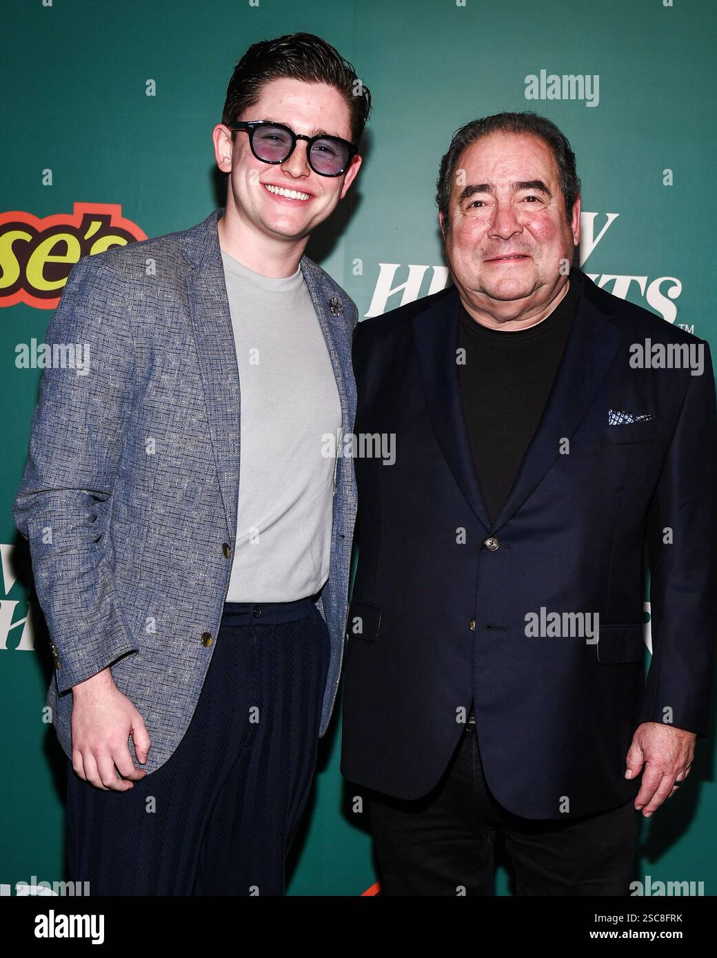 Emeril John Lagasse IV and Emeril Lagasse walking on the red carpet at ...