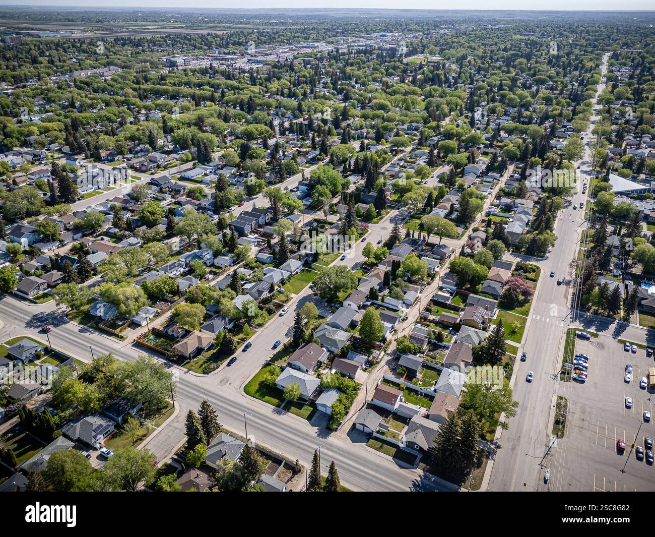 Residential area with many houses and trees. The houses are mostly ...