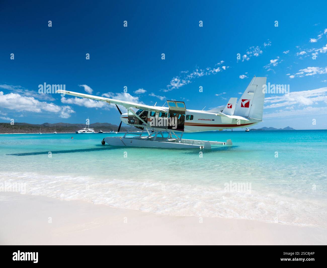 Seaplane at Whitehaven Beach in the Whitsundays Stock Photo - Alamy