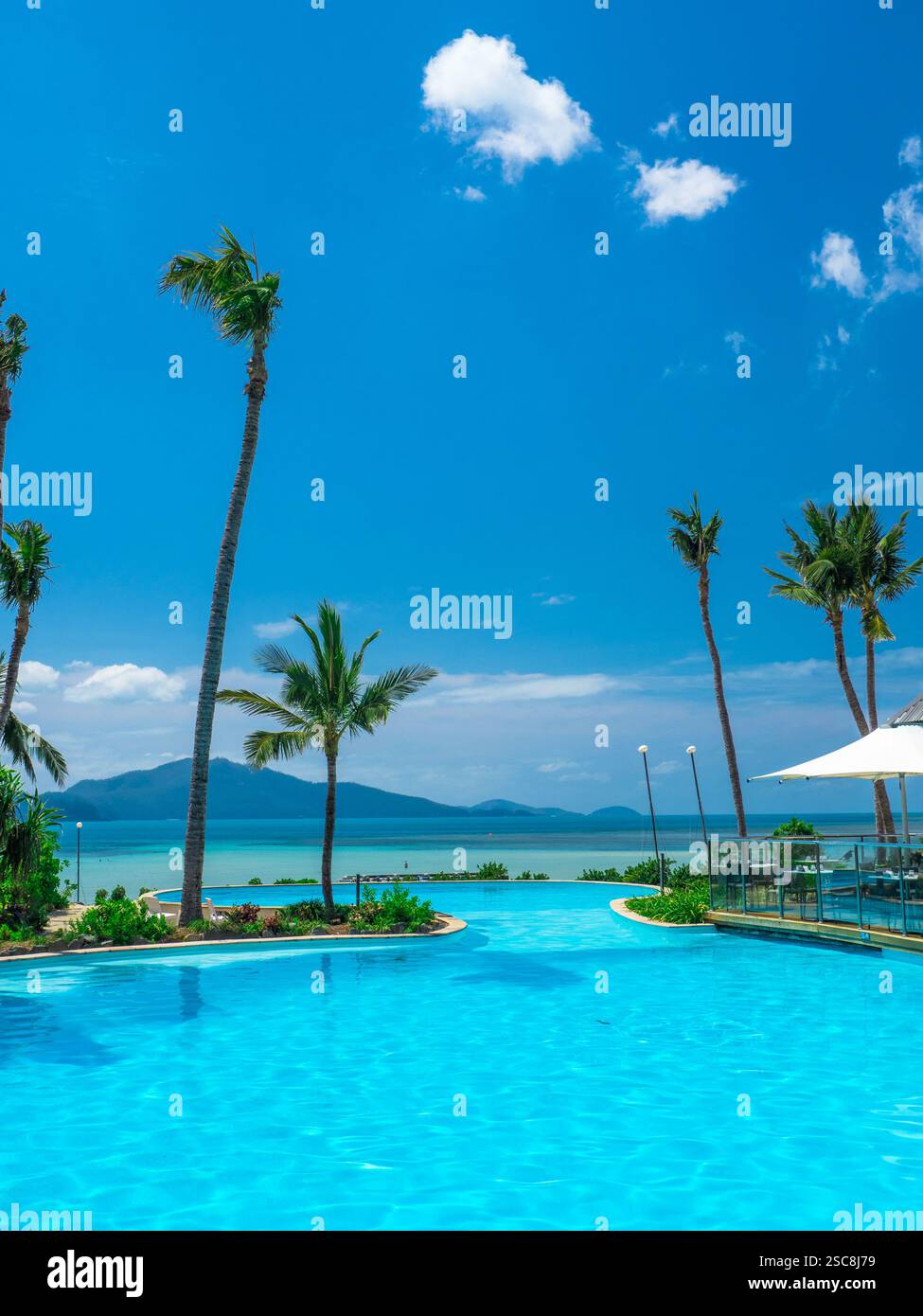 View from swimming pool at resort on Hamilton Island overlooking ...