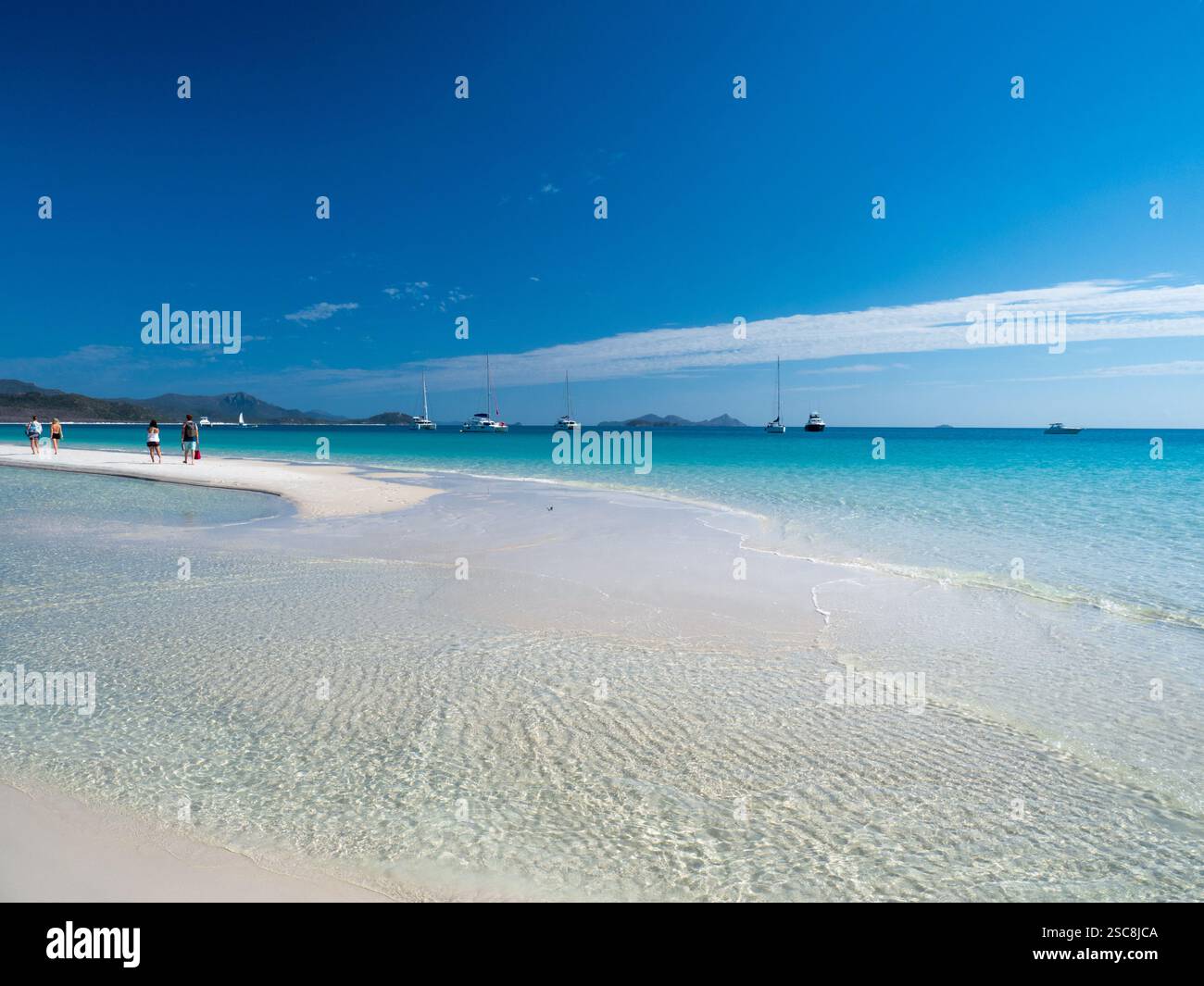 Walking on the beach at Whitehaven Beach in the Whitsundays Stock Photo ...