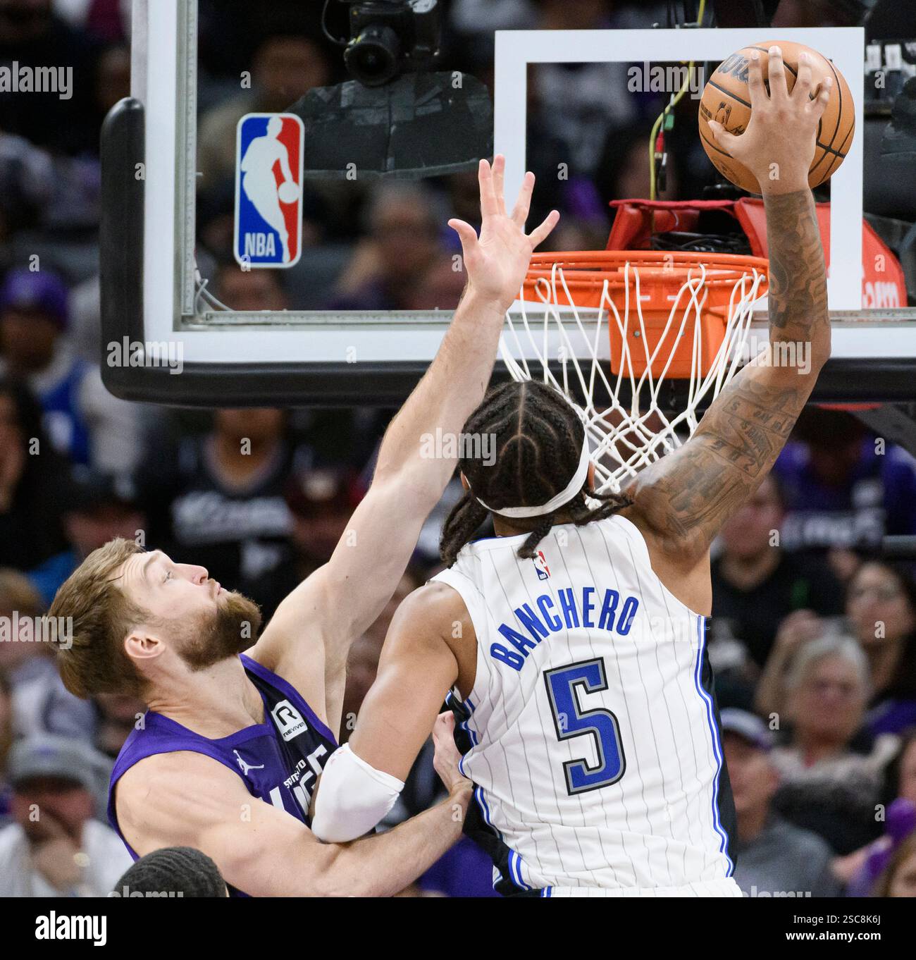 Orlando Magic forward Paolo Banchero (5) dunks over Sacramento Kings ...