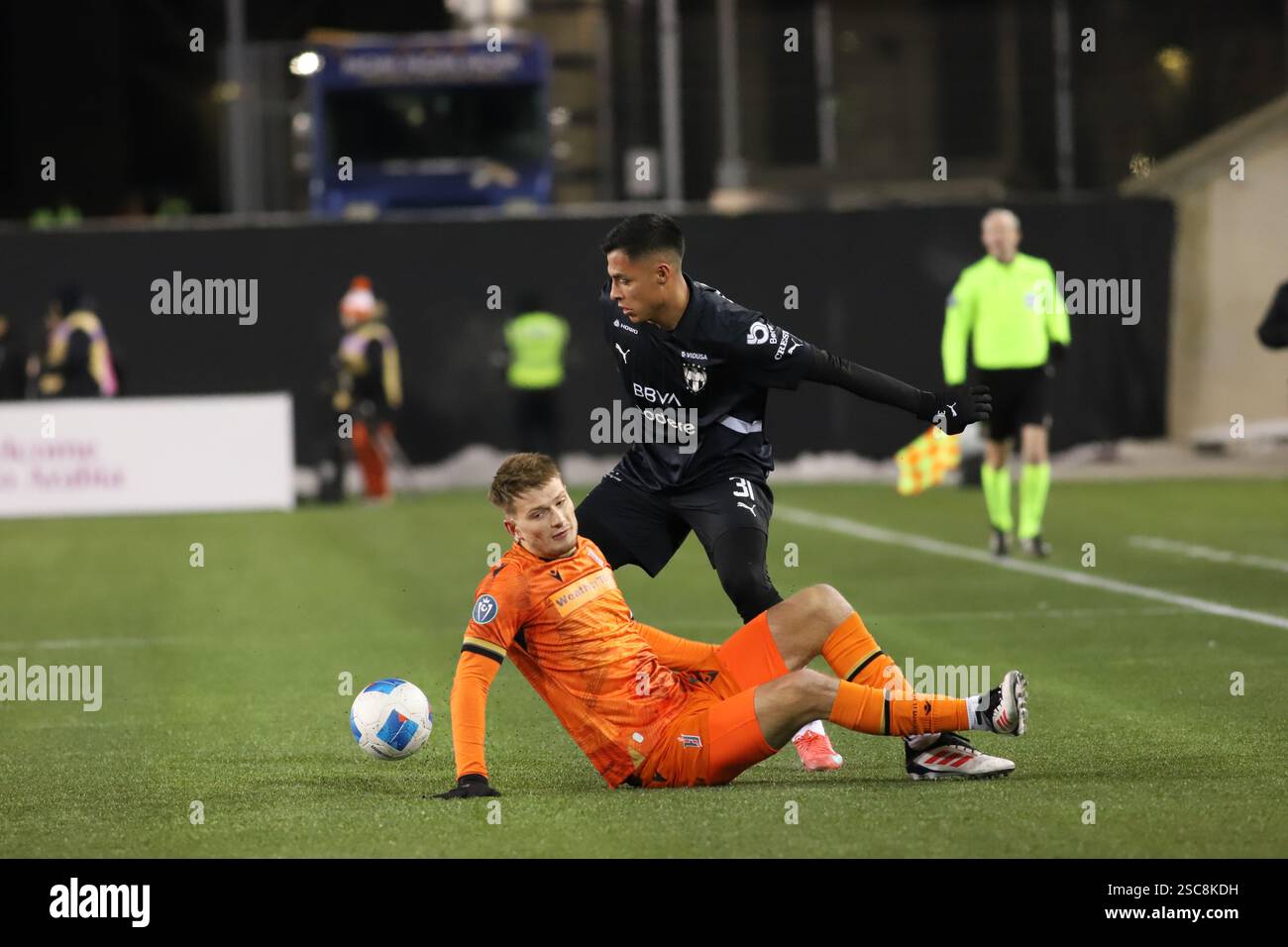 Roberto de la Rosa #31 of Monterrey FC avoids the swept of Daniel ...