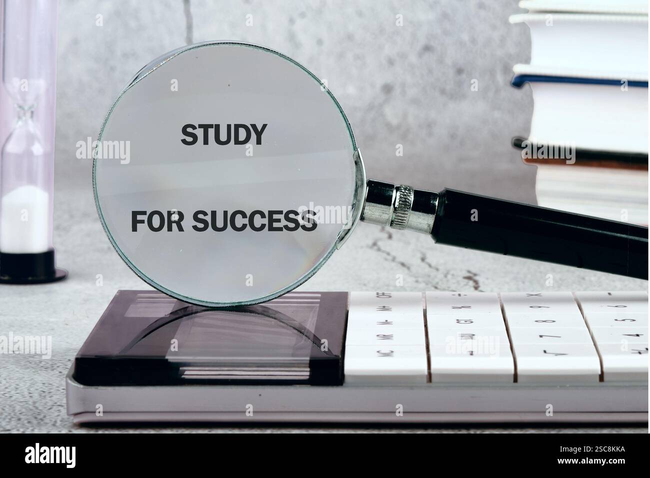 Focusing on education concepts, a magnifying glass highlights the text ...