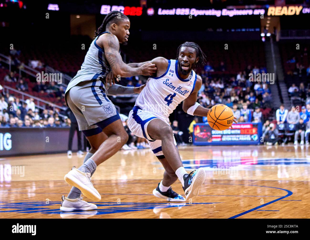 Seton Hall Pirates forward Prince Aligbe (4) gets pressure fromButler ...