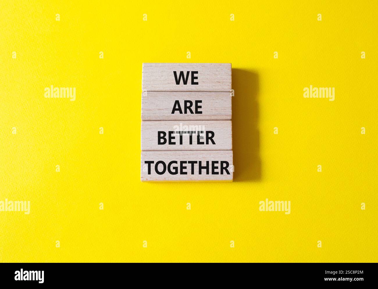 We are stronger together symbol. Wooden blocks with words We are ...
