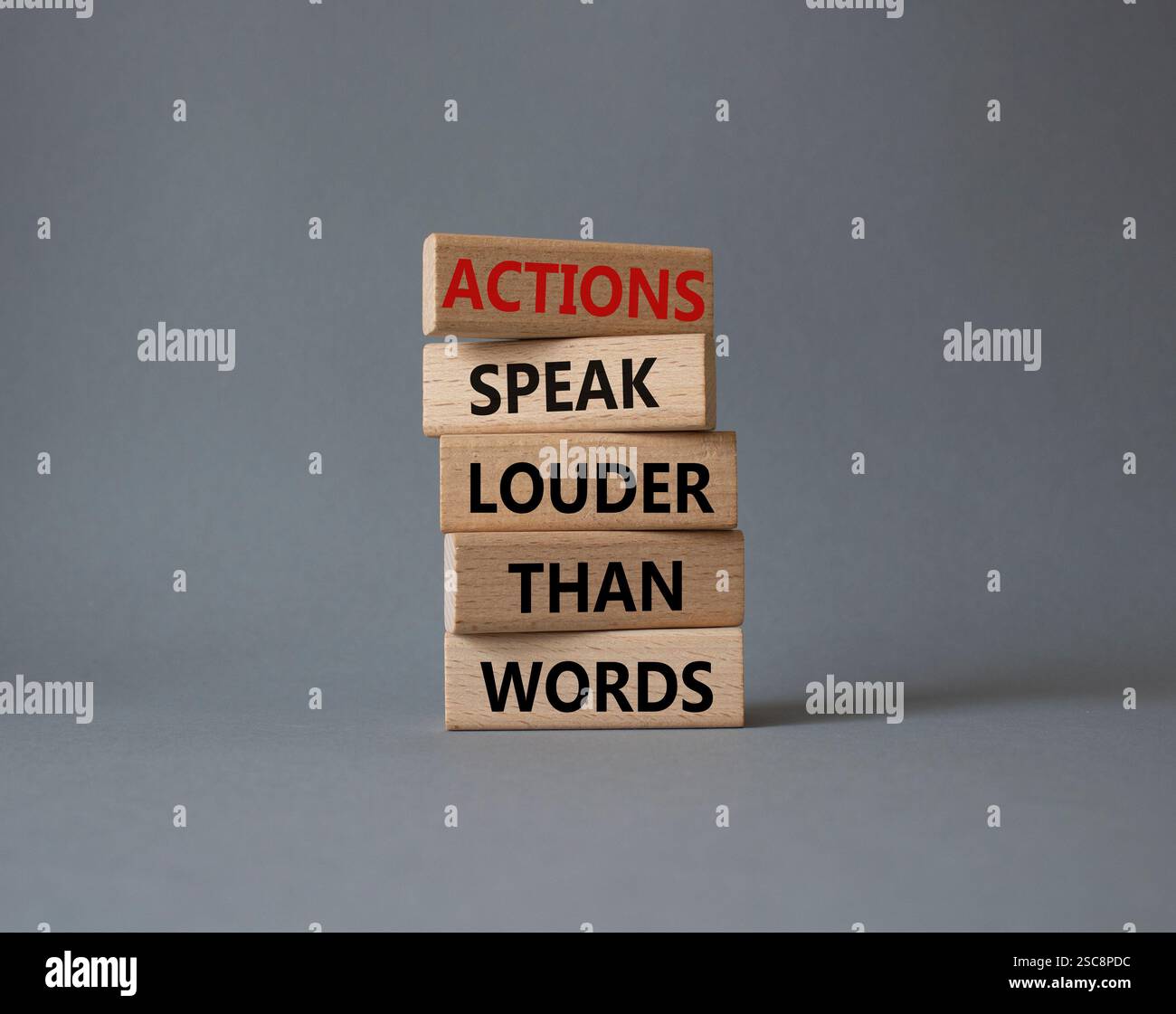 Actions speak louder than Words symbol. Wooden blocks with words ...