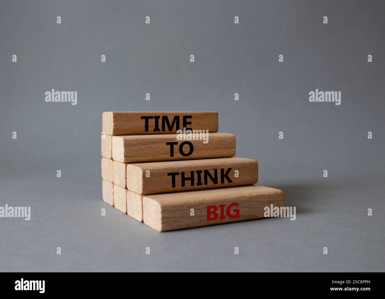 Time to think big symbol. Wooden blocks with words Time to think big ...