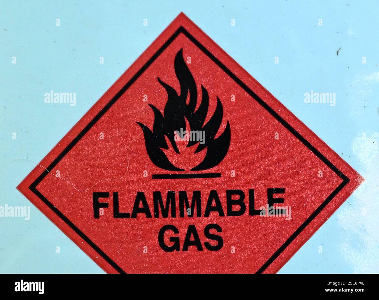 A warning sign is seen on a barbeque LPG (Liquified Petroleum Gas) Gas ...