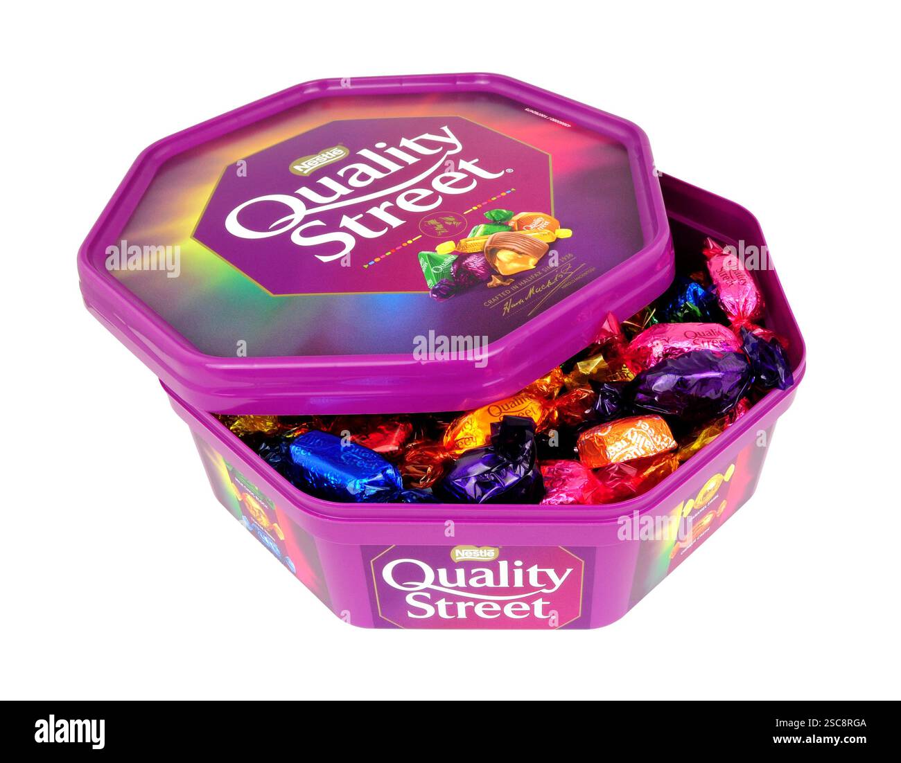 Tub of Nestle quality street assorted milk and dark chocolates in a ...