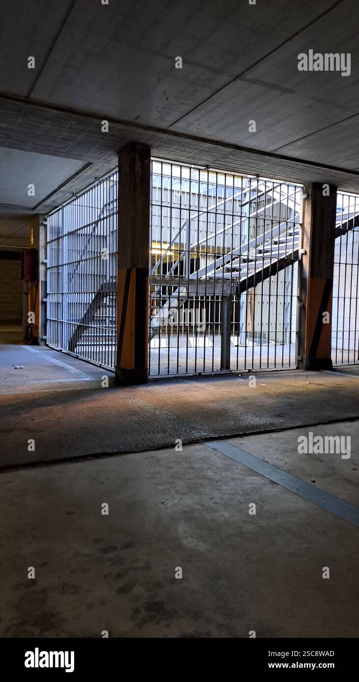 Detail of the metal lock in the underground parking. Dark lights Stock ...